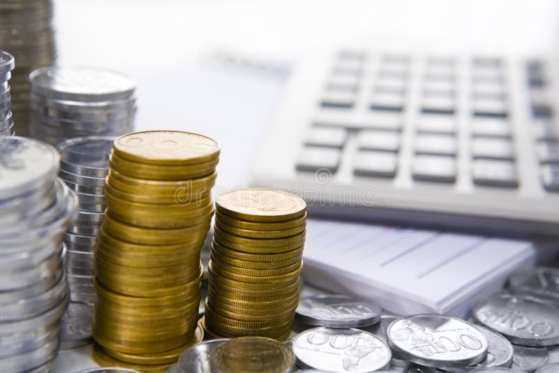 Stack of Coins and Calculator Stock Image - Image of book, business ...