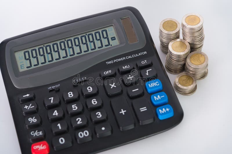 Stack of Coins and Calculator on White Background. Stock Photo - Image ...