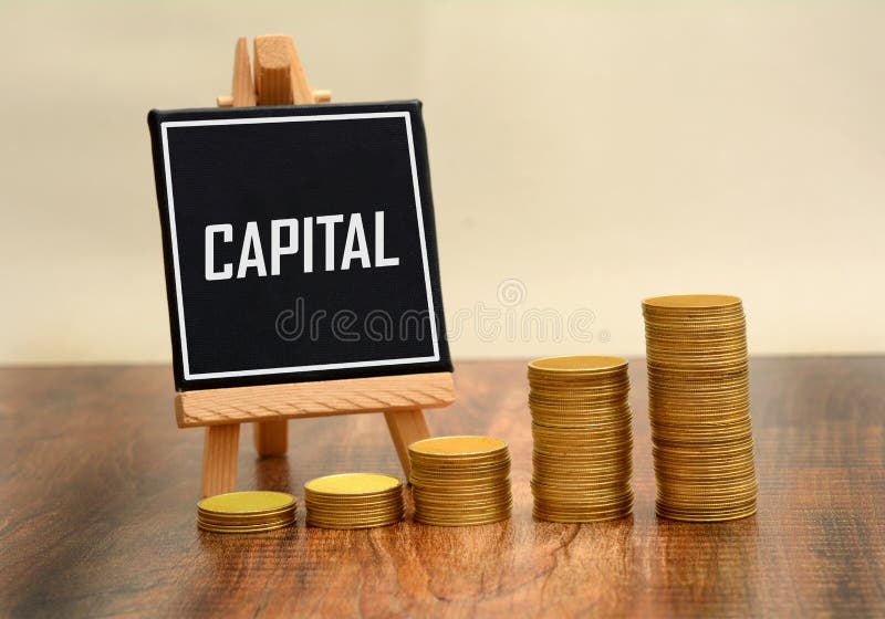 Stack of Coins with Capital Sign - Business Money Concept Stock Photo ...