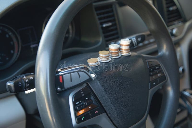Stack of coins with a car stock image. Image of loan - 344739487