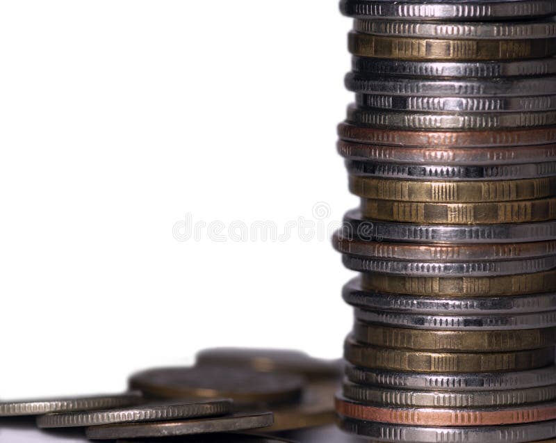 A Stack of Coins of Different Denominations on a White Background Stock ...