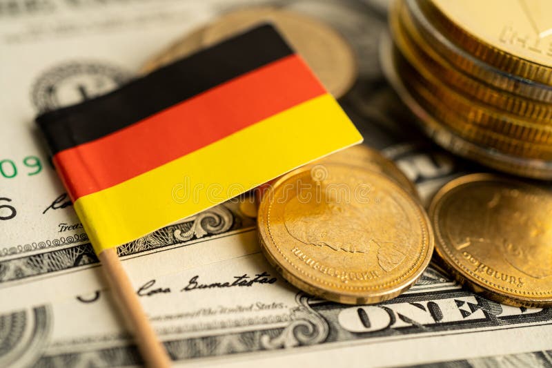 Stack of Coins with Germany Flag and US Dollar Banknotes Stock Photo ...