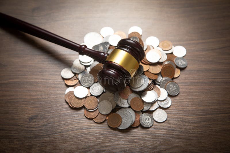 Stack of Coins with Judge Gavel Stock Photo - Image of judge, trial ...