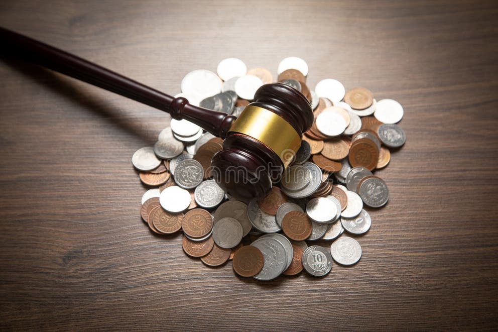 Stack of Coins with Judge Gavel Stock Photo - Image of judge, trial ...