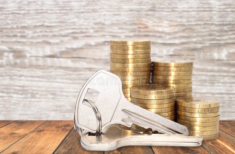 Stack of coins with keys stock photo. Image of nature - 104608232