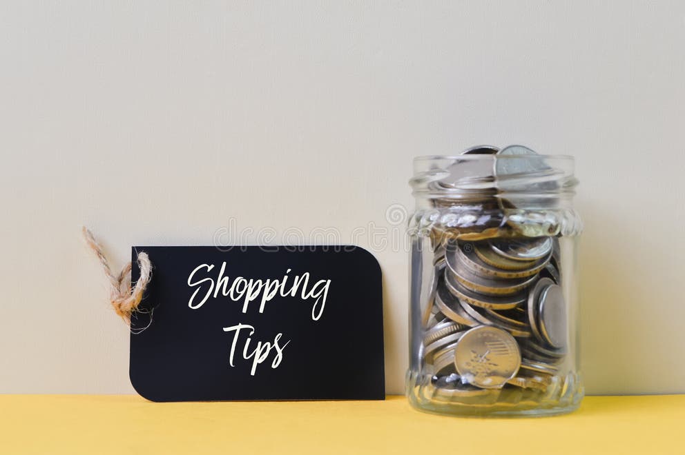 Stack of Coins and Label Tag Written with SHOPPING TIPS Stock Photo ...