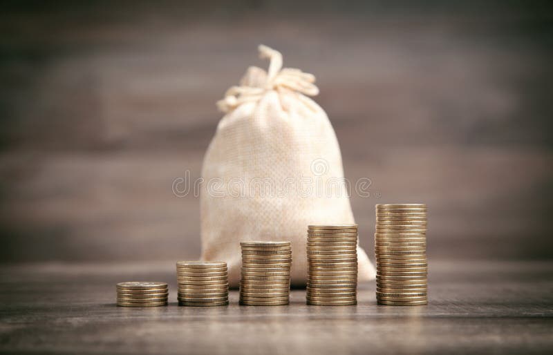 Stack of Coins and Money Bag. Finance. Saving Stock Photo - Image of ...
