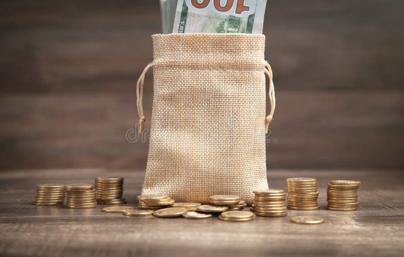 Stack of Coins and Money Bag. Finance. Saving Stock Photo - Image of ...