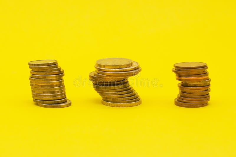 Stack of Coins on a Orange or Yellow Background. Money Saving Concept ...