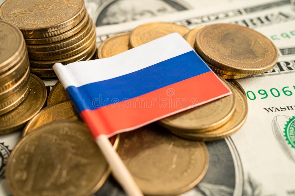 Stack of Coins with Russia Flag on US Dollar Banknotes Background Stock ...