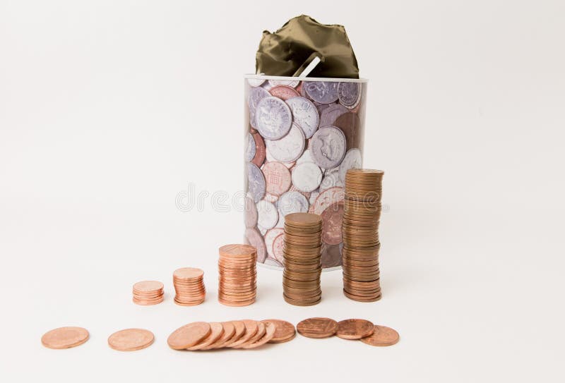 A Stack of Coins Standing a Front of Opened Metal Money Box Stock Photo ...