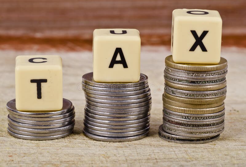 Stack of Coins with Tax Written on it Stock Image - Image of stack ...