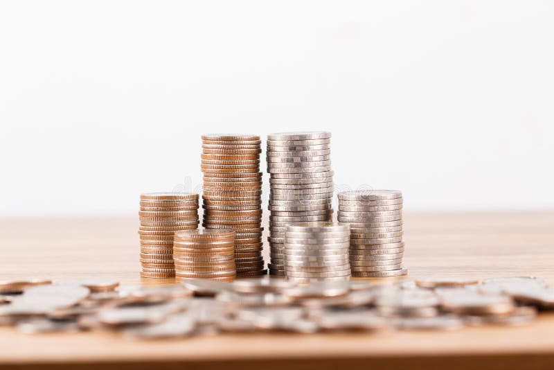Stack of Coins on Wooden Desk for Saving Money Stock Image - Image of ...