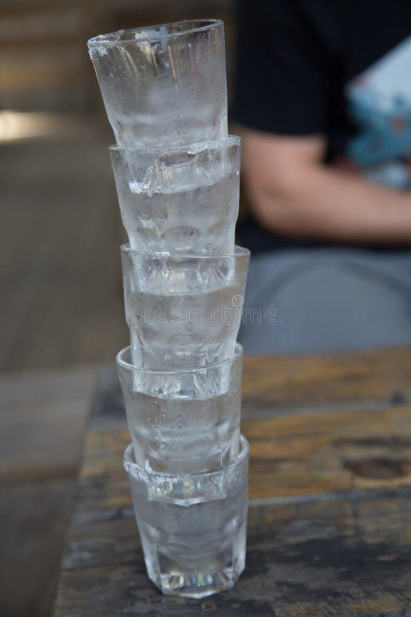 Stack of Cold Shot Glasses stock image. Image of glasses - 56174551