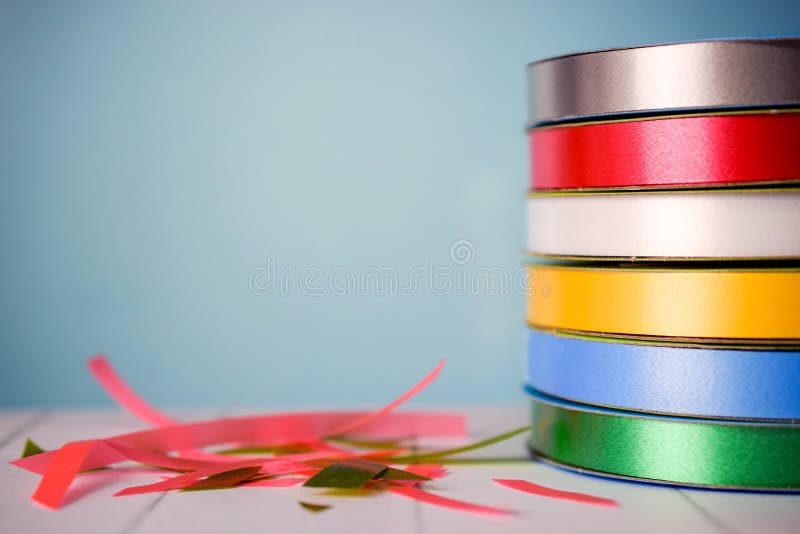 Stack of Color Ribbons on Table Stock Photo - Image of blue, colorful ...