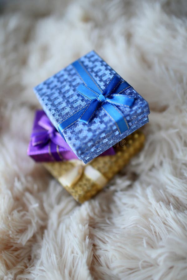 A Stack of Colored Gift Boxes Stock Photo - Image of gift, light: 81618396