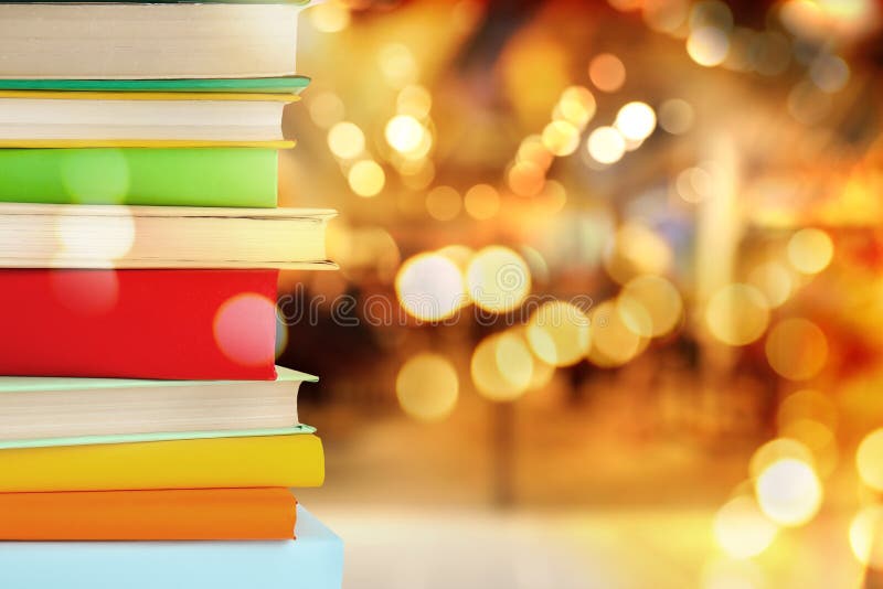 Stack of Colorful Books on Background, Space for Text. Bokeh Effect ...
