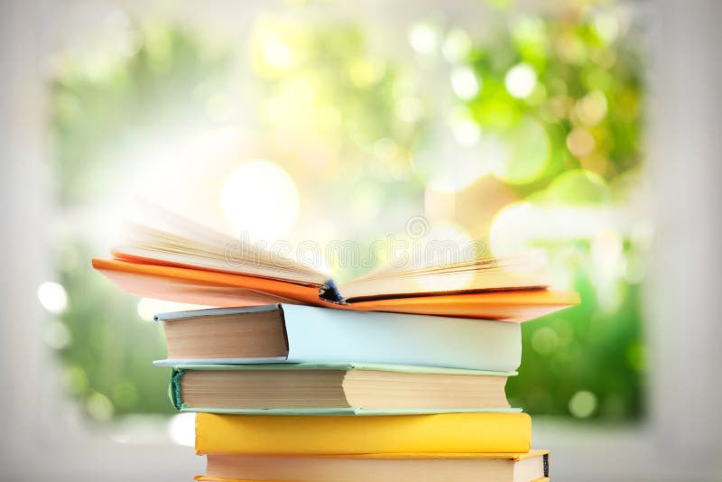 Stack of Colorful Books on Blurred Background Stock Image - Image of ...