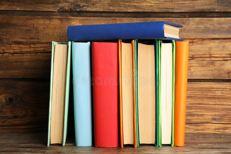 Stack of Colorful Books on Table Stock Image - Image of manual, read ...