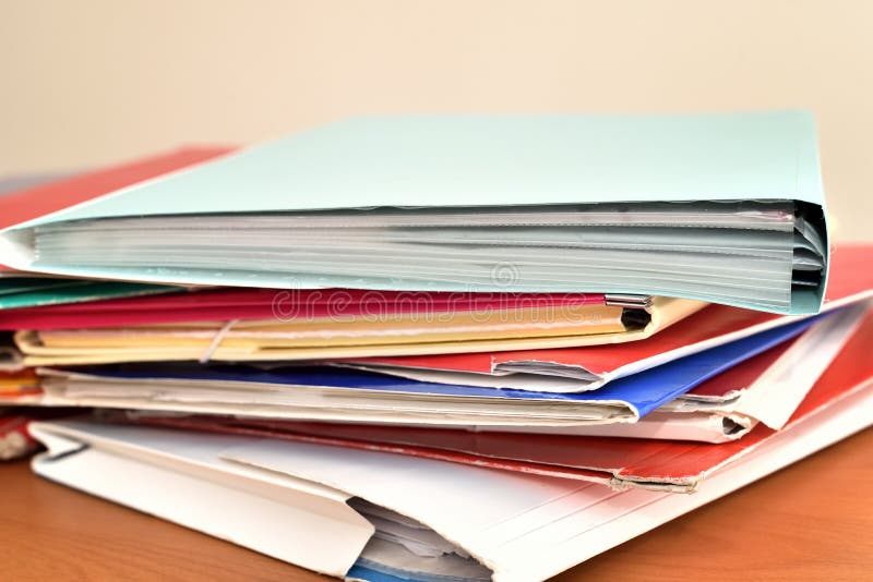 Stack of Document File Folders on the Brown Wooden Desk Stock Image ...
