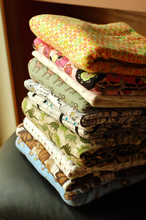Stack of colorful fabrics stock photo. Image of colorful - 12306726
