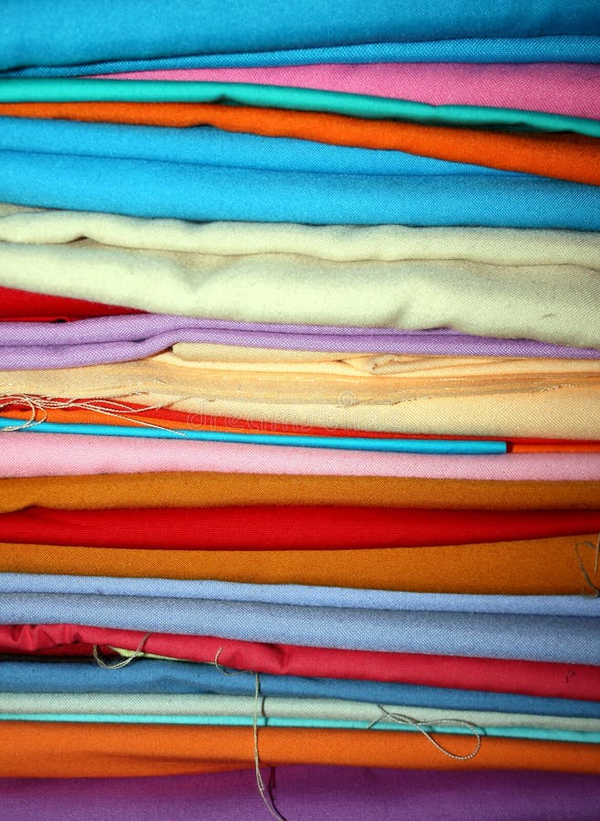 Stack of Colorful Fabrics stock photo. Image of stack - 17090010