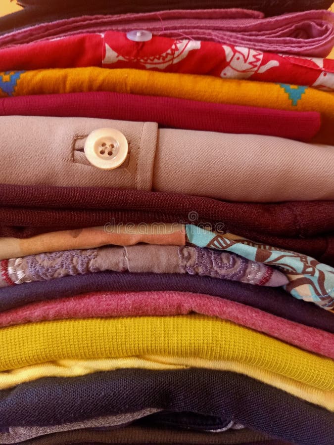 A Stack of Ironed and Folded Clothes Stock Photo - Image of cotton ...