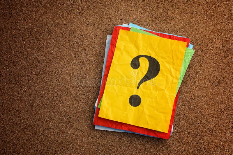 A Stack of Colorful Paper Notes with Question Marks on Them on a Cork ...