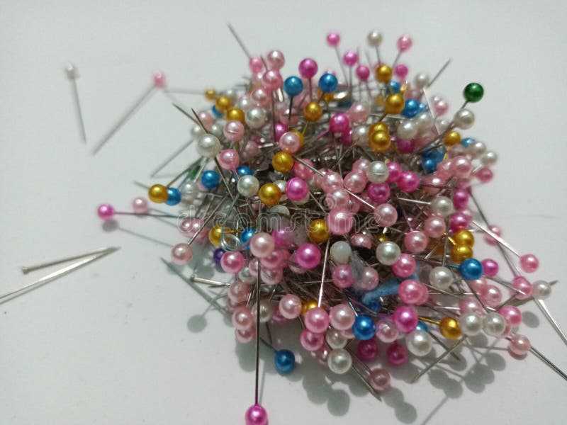 Stack of Colorful Pins on a White Background Stock Photo - Image of ...