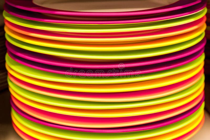 Stack of colorful plates stock image. Image of container - 117781371