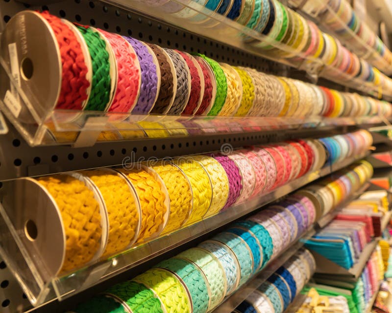 Stack of Colorful Sewing Threads, Spools of Thread on Shelves at Retail ...