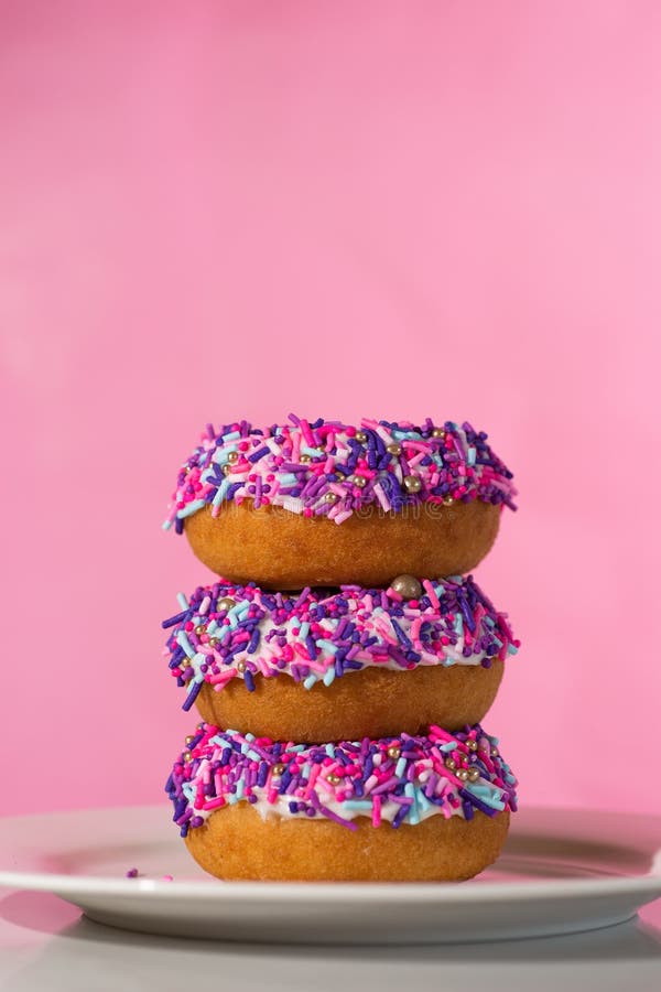 Stack of Colorful Sprinkle Birthday Donuts Stock Image - Image of sweet ...