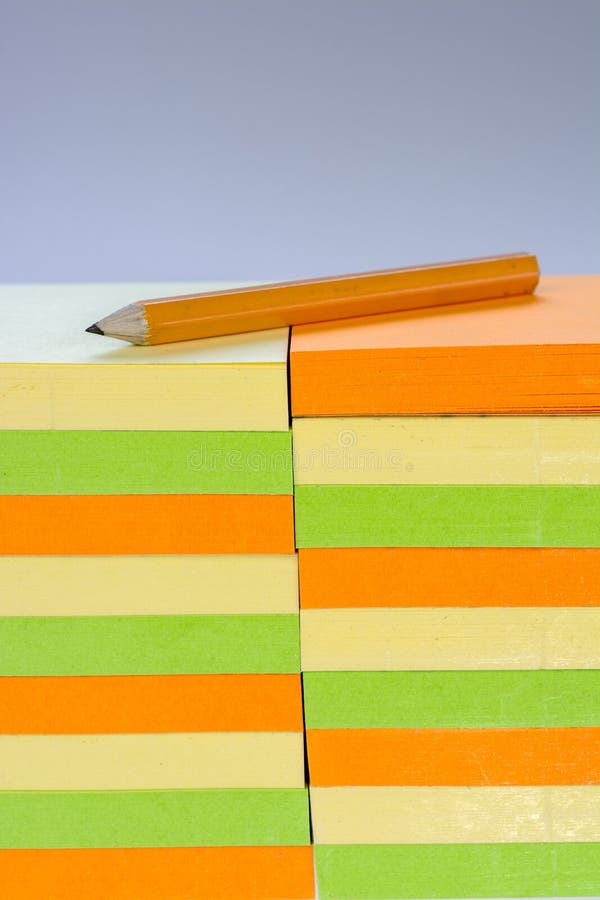 Stack of Colorful Sticky Note Pads with Pencil Stock Photo - Image of ...