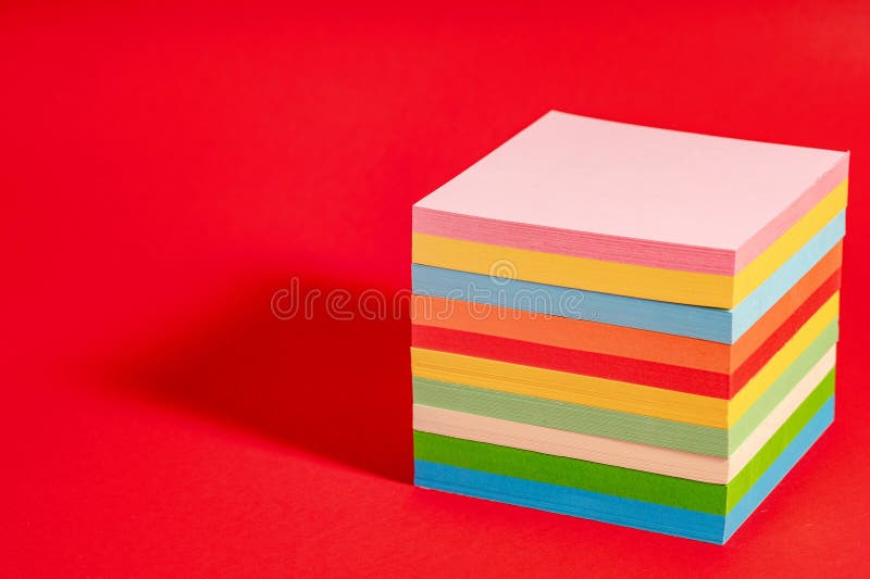 Stack of Colorful Sticky Notes Isolated on Red Background Stock Photo ...