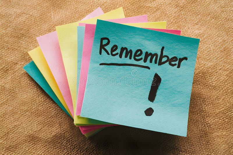 Colorful Sticky Notes with REMEMBER Written in Black on Turquoise Note ...