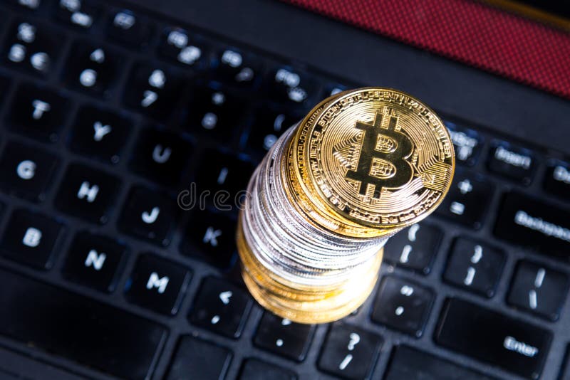 Stack of Conceptual Cryptocurrency Bitcoin on Computer Keyboard Stock ...