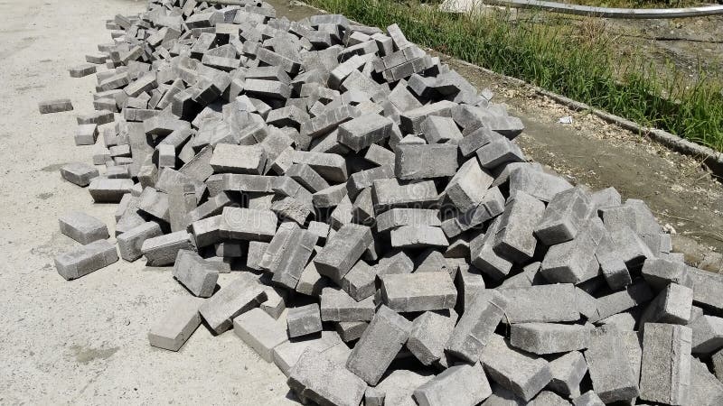 Stack of Concrete Bricks at Construction Site Stock Photo - Image of ...