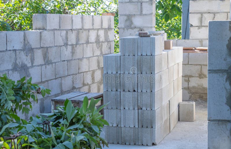 A Stack of Concrete Cinder Blocks is Set Up for Construction in the ...