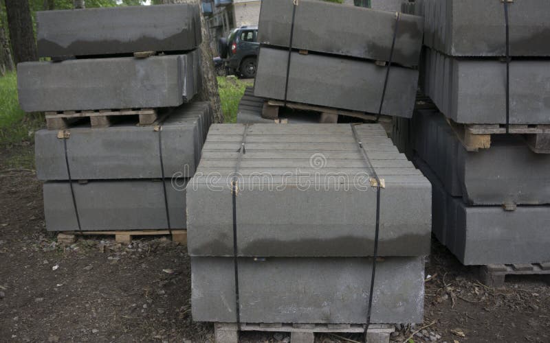 Stack of Concrete Curbstone. Construction Process Stock Image - Image ...