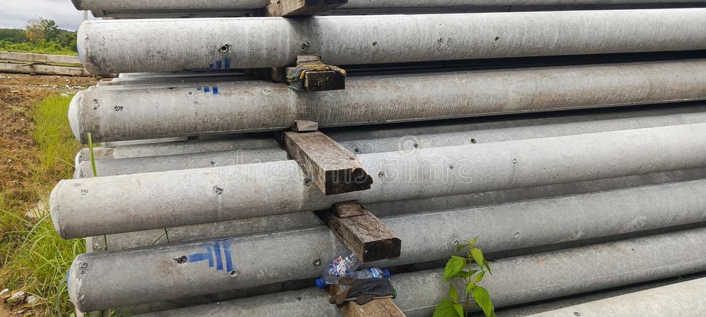Pile of Concrete Electric Poles for Medium Voltage Distribution Stock ...