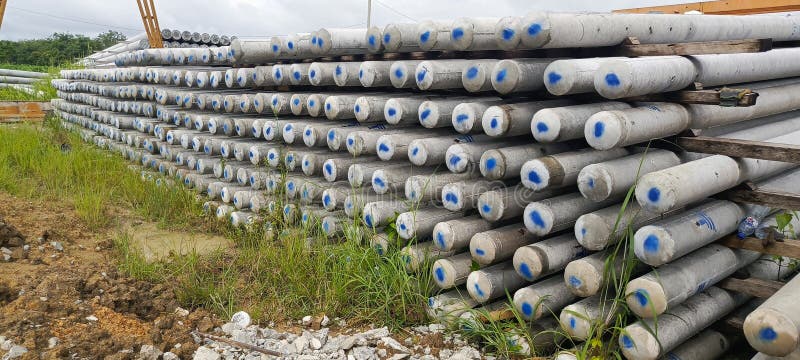 Pile of Concrete Electric Poles for Medium Voltage Distribution Stock ...