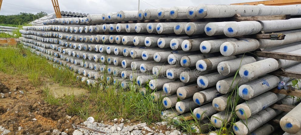 Pile of Concrete Electric Poles for Medium Voltage Distribution Stock ...