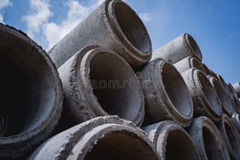 A Stack of Concrete Ring Pipes Piled and Creating a Symmetrical ...
