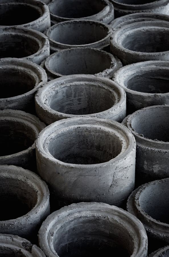 A Stack of Concrete Ring Pipes Piled and Creating a Symmetrical ...