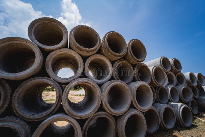 A Stack of Concrete Ring Pipes Piled and Creating a Symmetrical ...