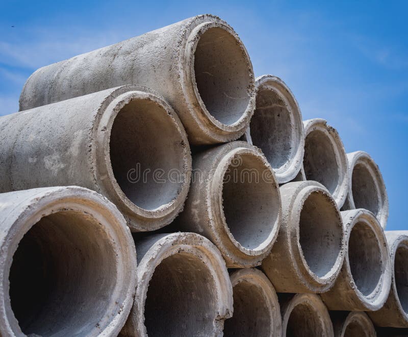 A Stack of Concrete Ring Pipes Piled and Creating a Symmetrical ...