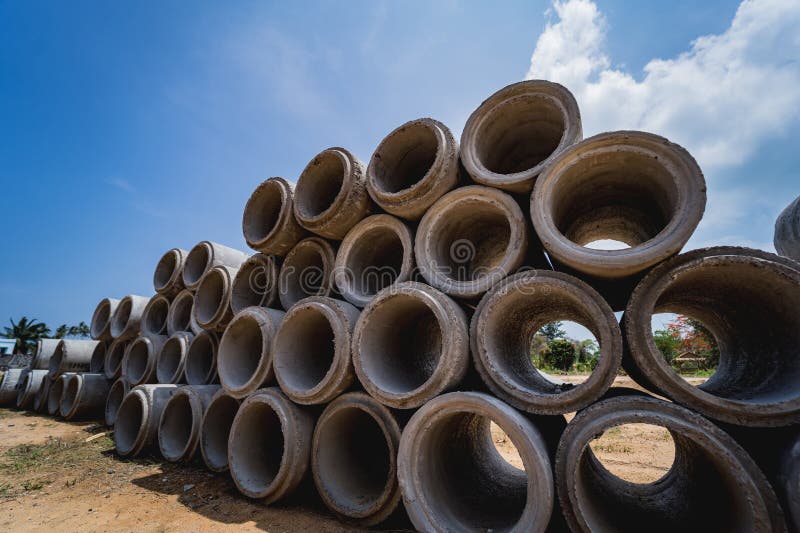A Stack of Concrete Ring Pipes Piled and Creating a Symmetrical ...