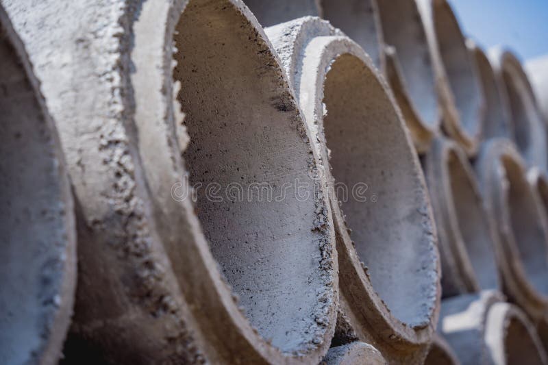 A Stack of Concrete Ring Pipes Piled and Creating a Symmetrical ...
