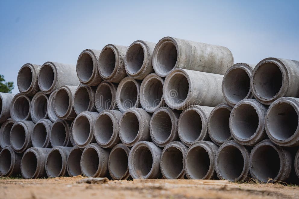 A Stack of Concrete Ring Pipes Piled and Creating a Symmetrical ...
