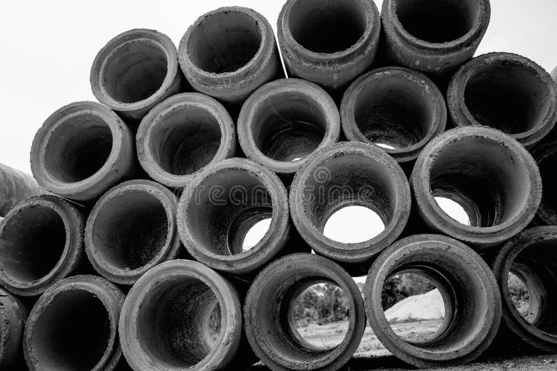 A Stack of Concrete Ring Pipes Piled and Creating a Symmetrical ...